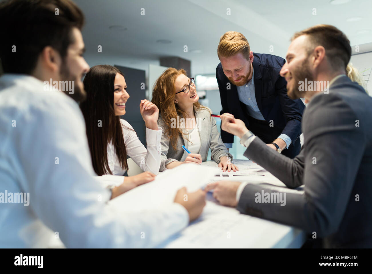 Happy business people achieving success Stock Photo - Alamy
