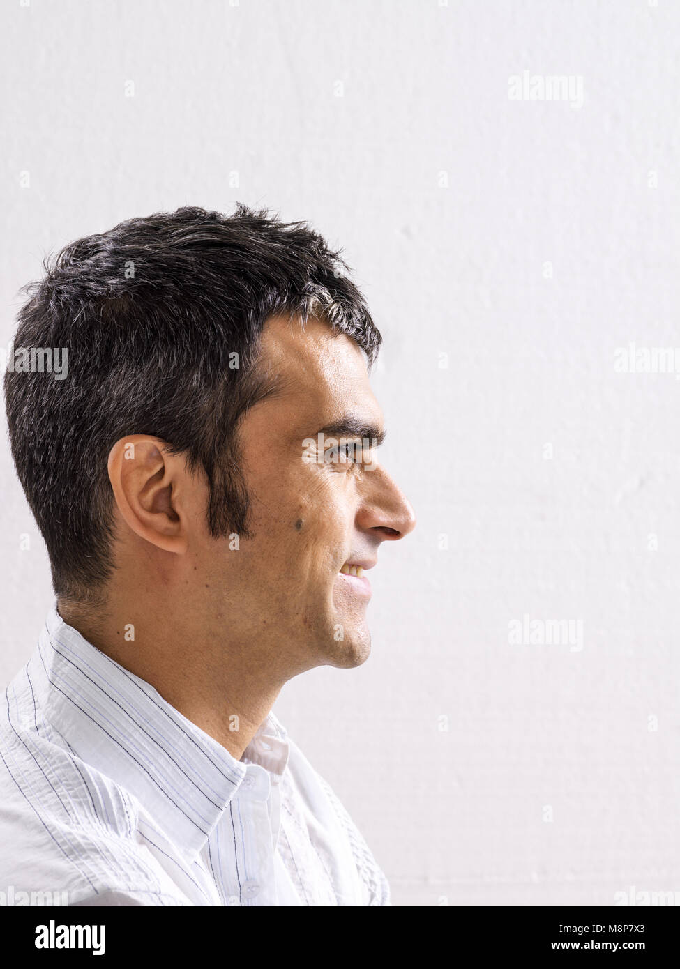 Studio portrait of middle aged white male in his early forties against ...