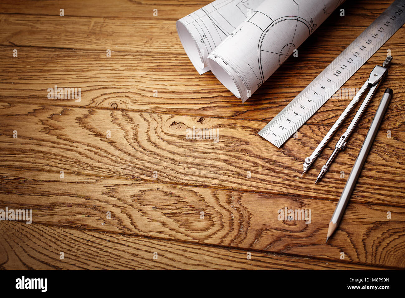 Architectural drawings. instruments on the worktable. Drawing compass ...