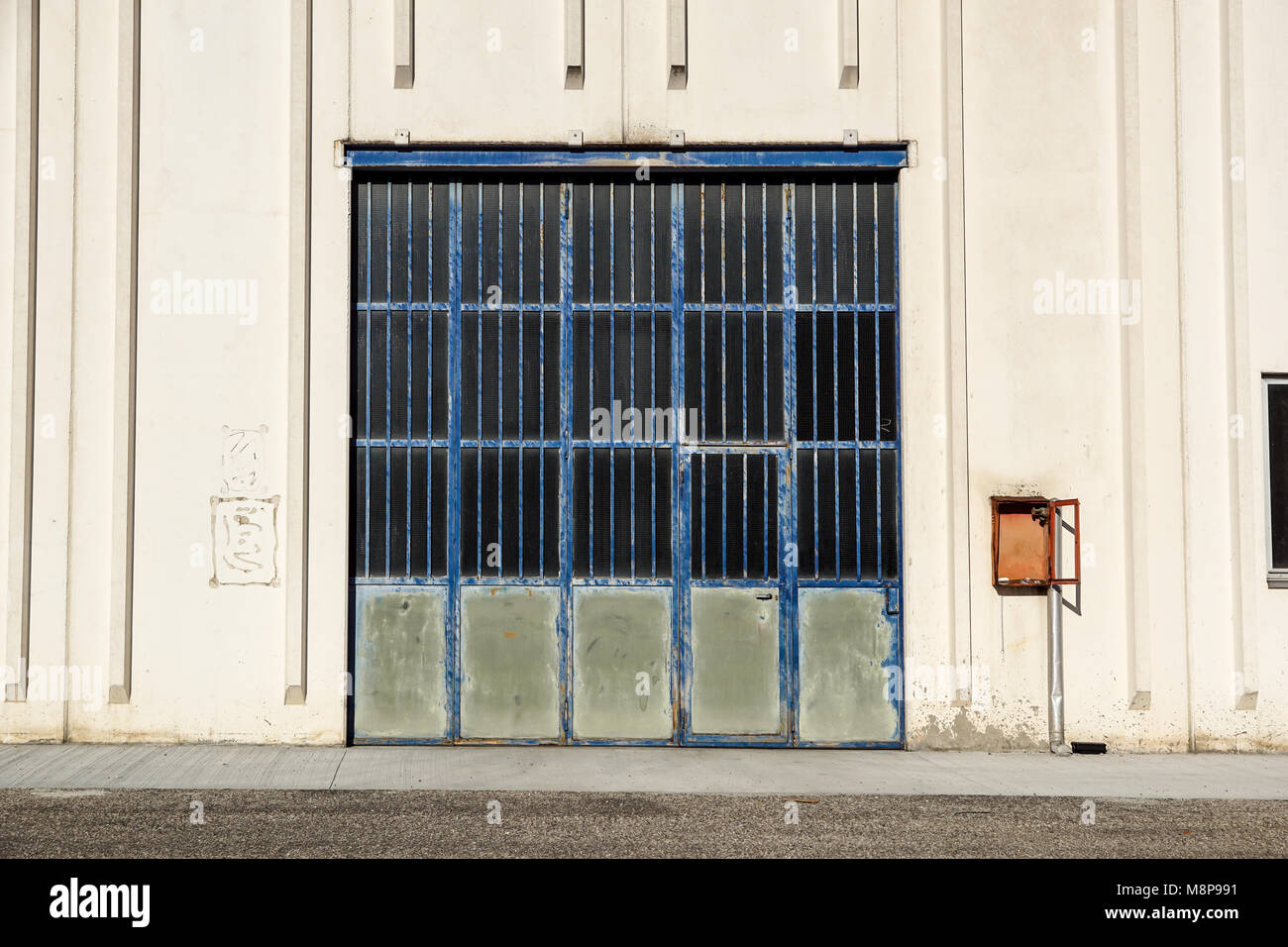 Cargo gate of Industrial warehouse. Industrial door. View on the one ...