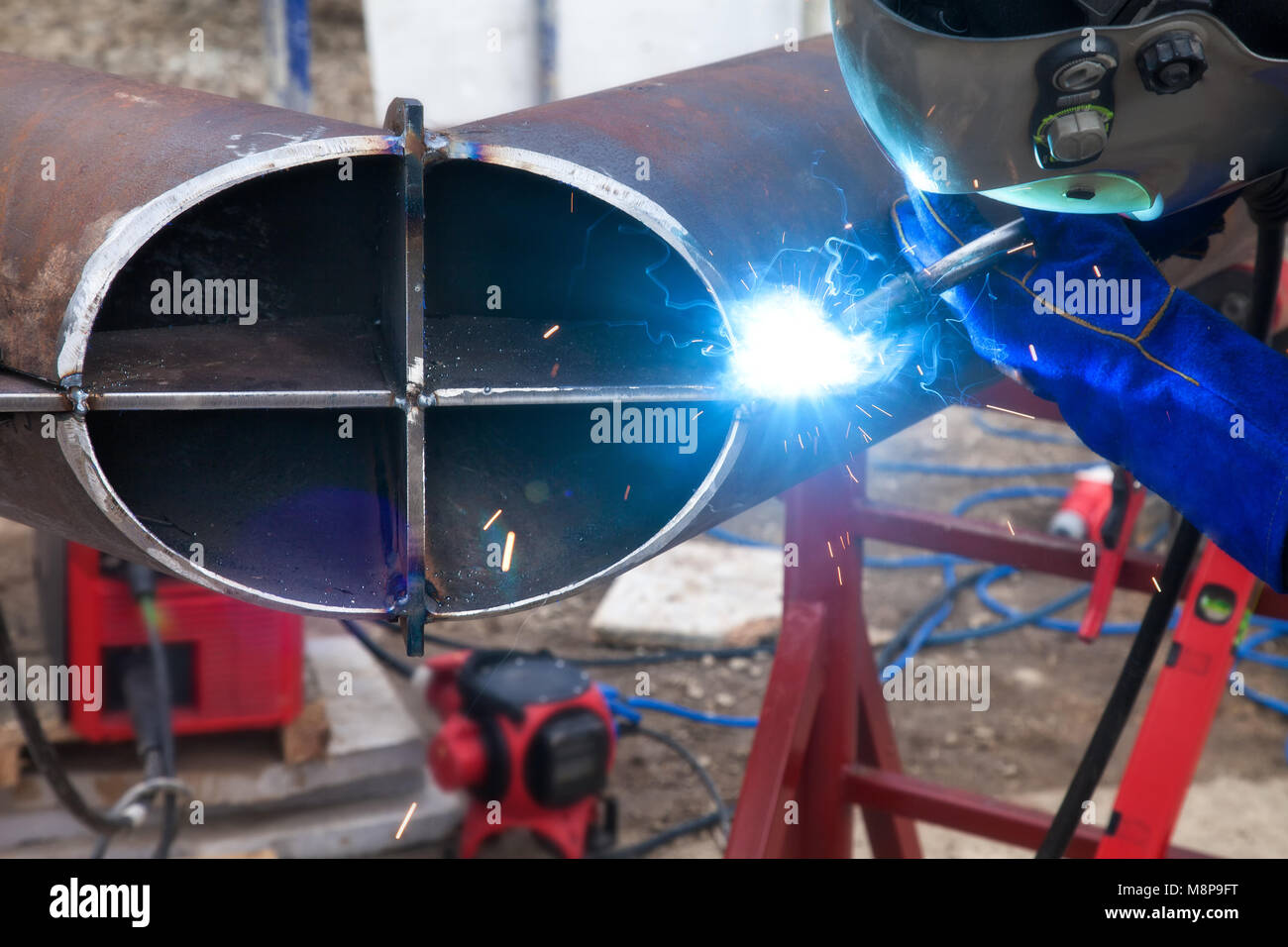 Welding work, welder welding metal material in heavy industry ...