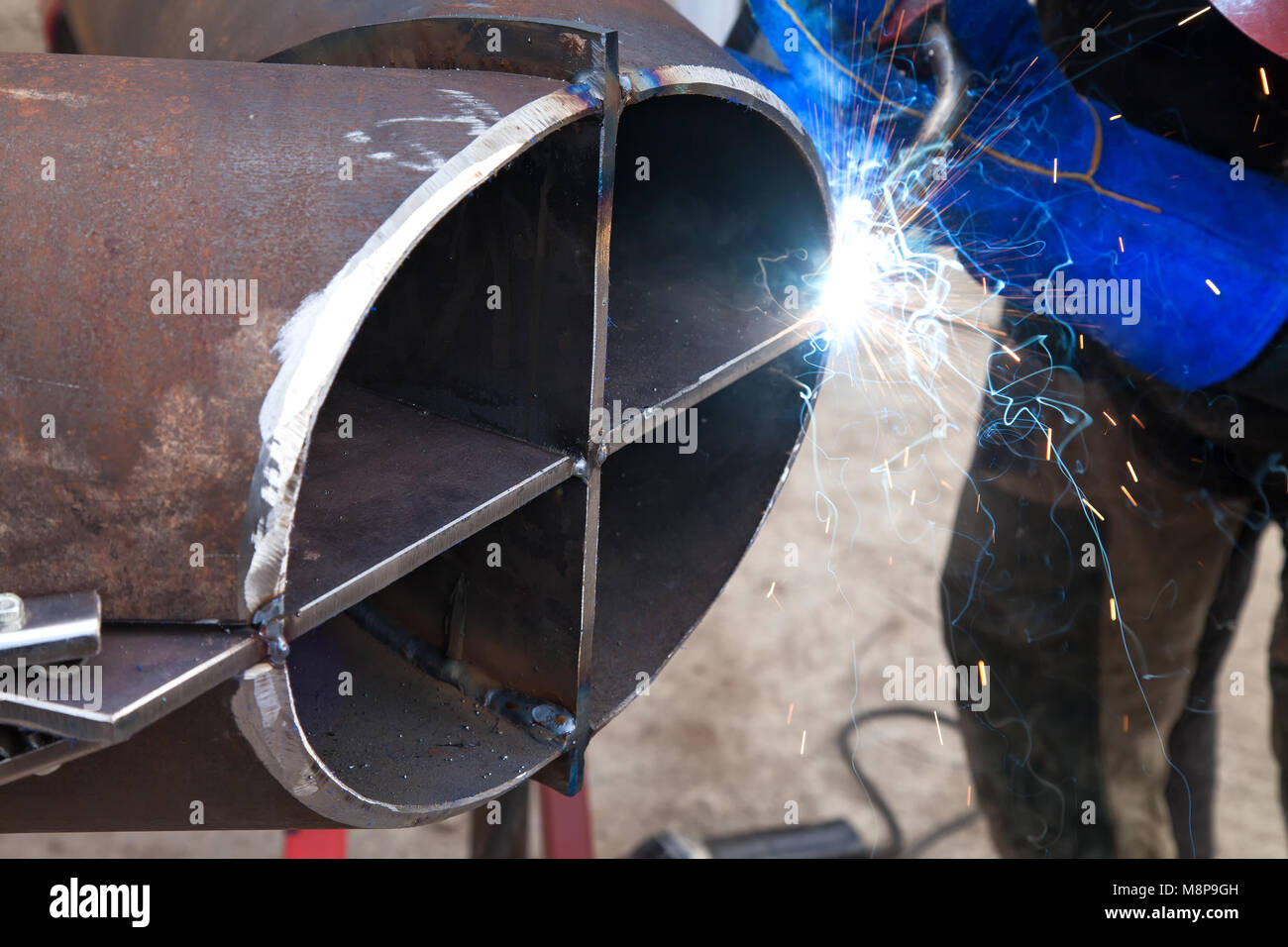 Welding work, welder welding metal material in heavy industry ...