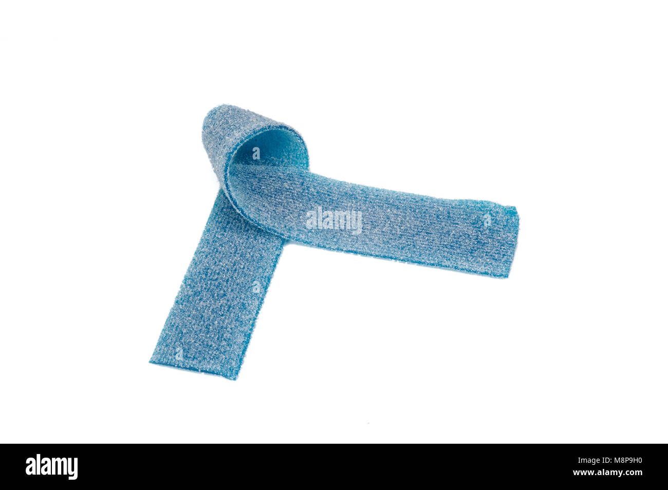 one licorice blue candy on white Stock Photo - Alamy