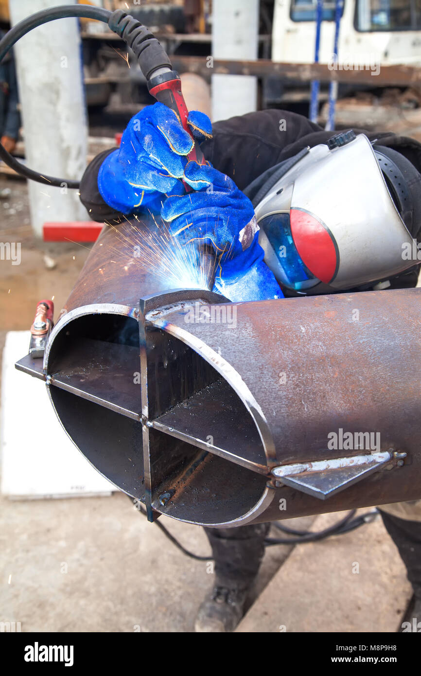 Welding work, welder welding metal material in heavy industry ...