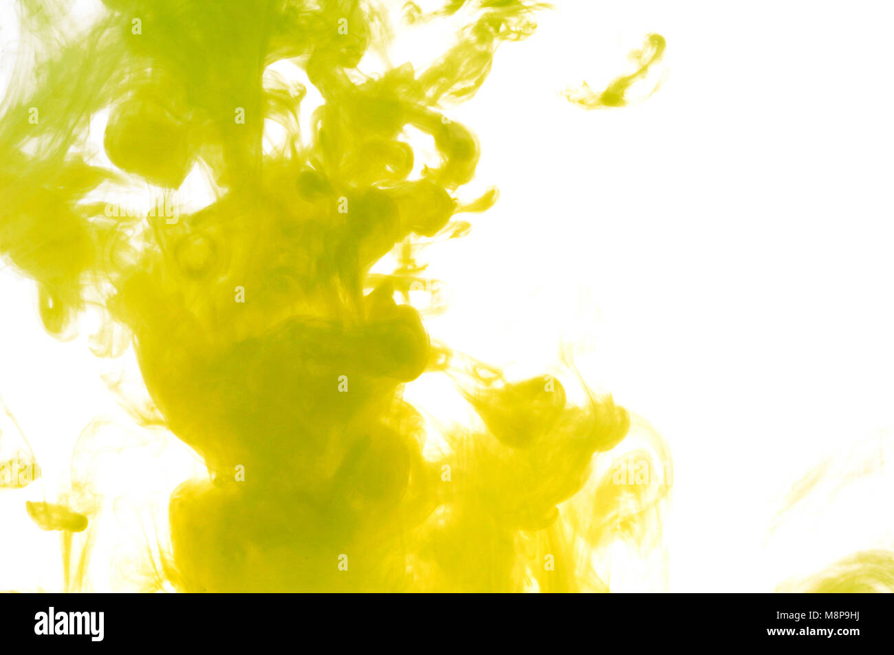 color dissolved in water with white background Stock Photo - Alamy