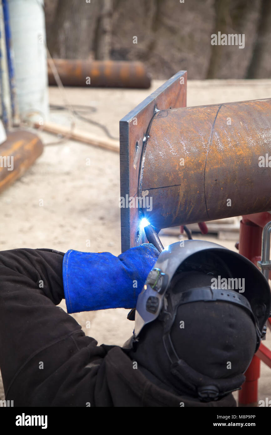 Welding work, welder welding metal material in heavy industry ...