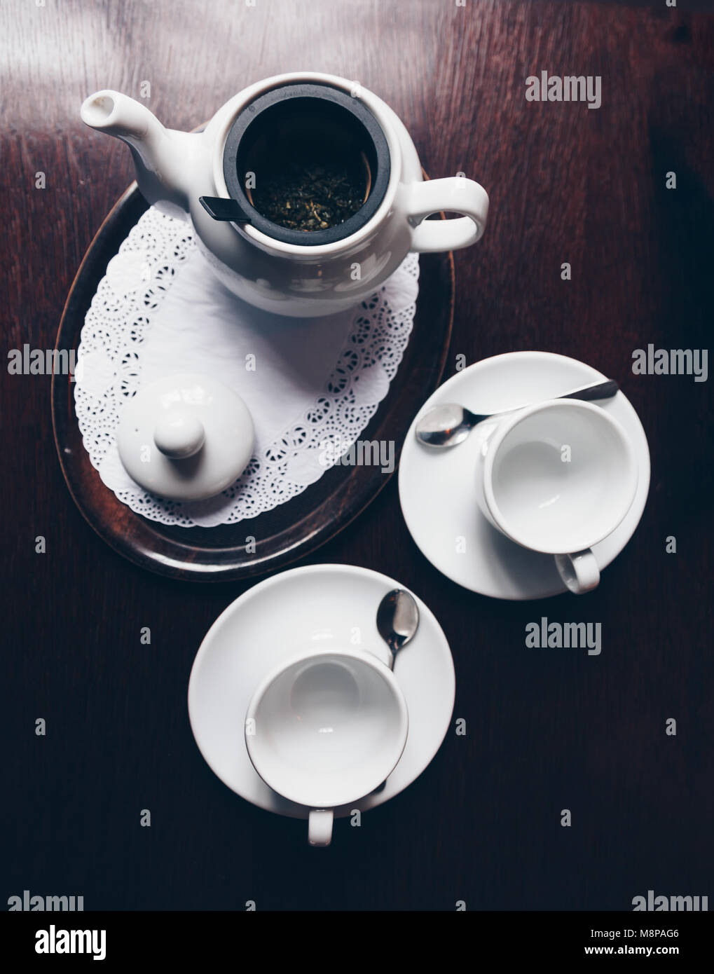 Aerial view of a table with desserts and tea Stock Photo - Alamy