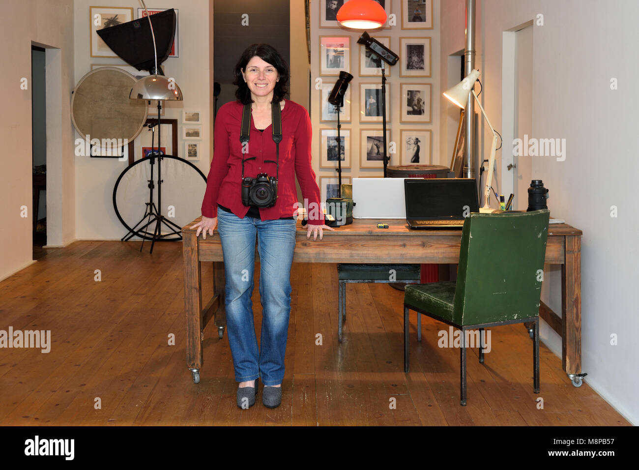 woman working in a photography studio Stock Photo - Alamy