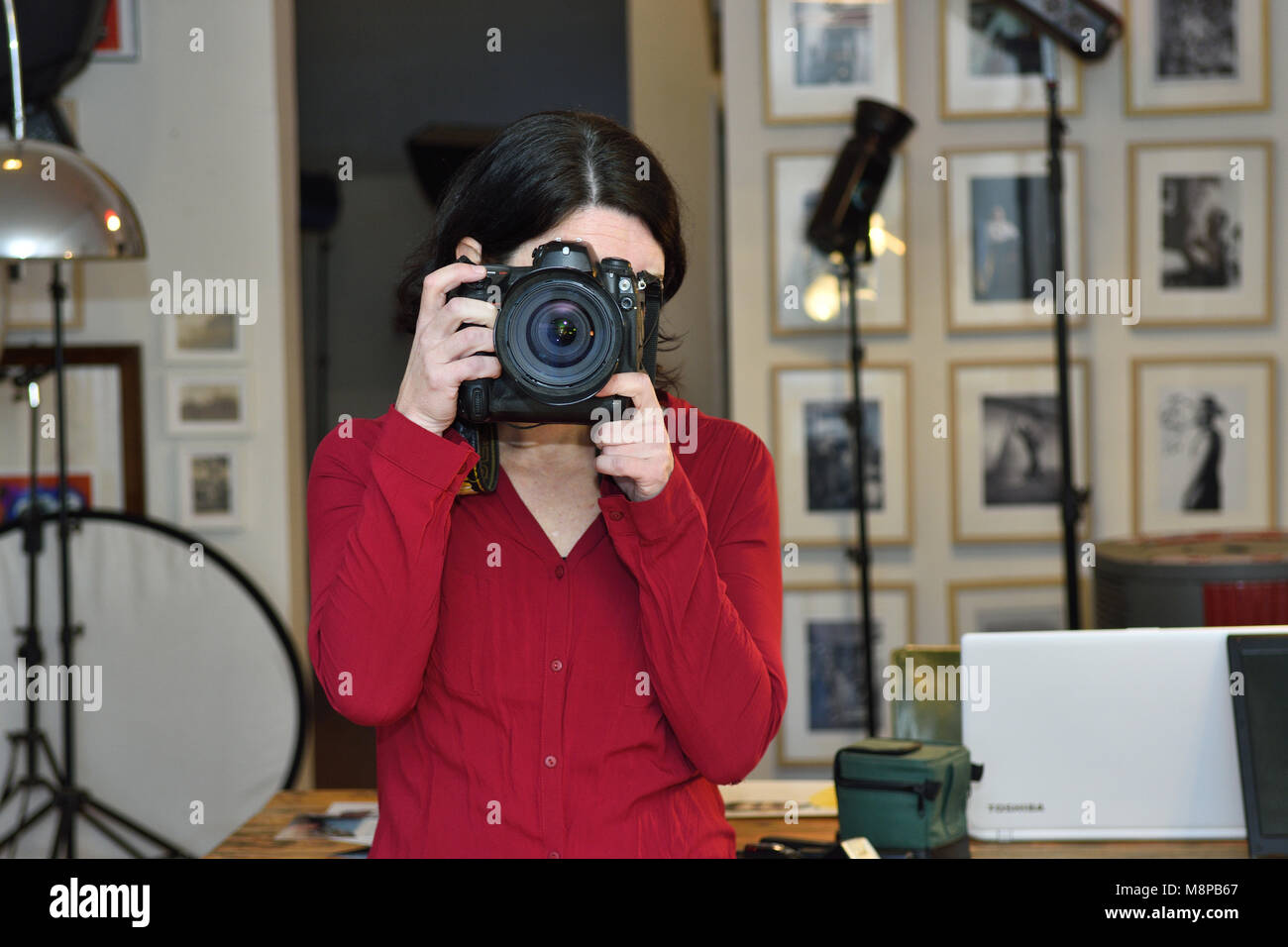 woman working in a photography studio Stock Photo - Alamy