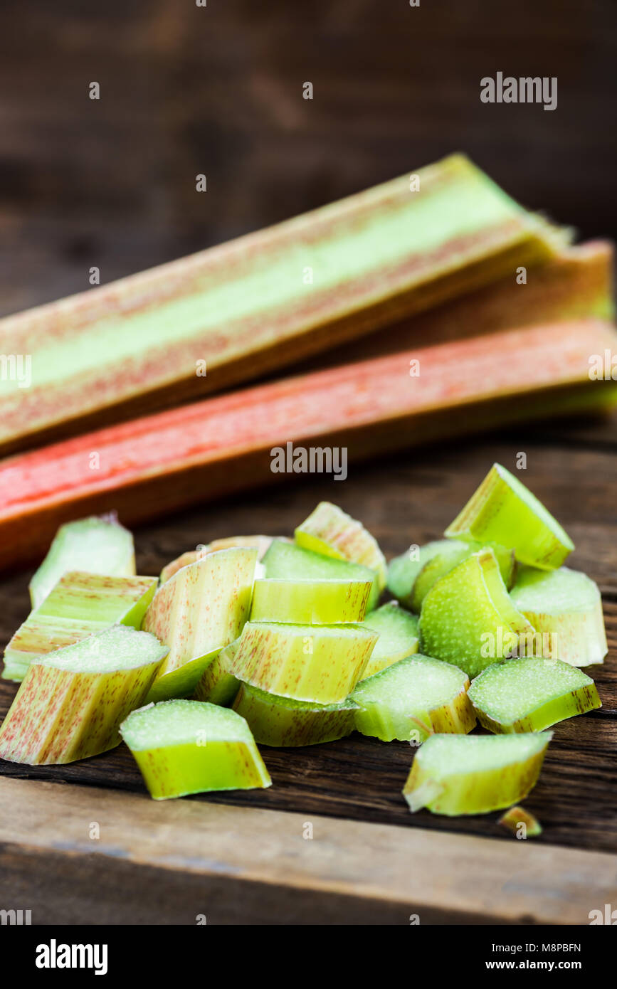 Pieces of Raw and Fresh Cut Rhubarb on Dark Rustic Background Stock ...