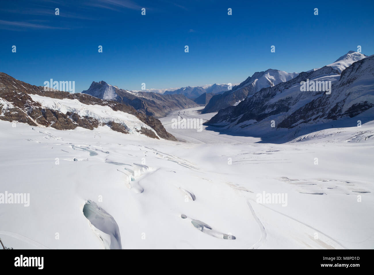Snow covered Mountain range in Switerland Stock Photo - Alamy