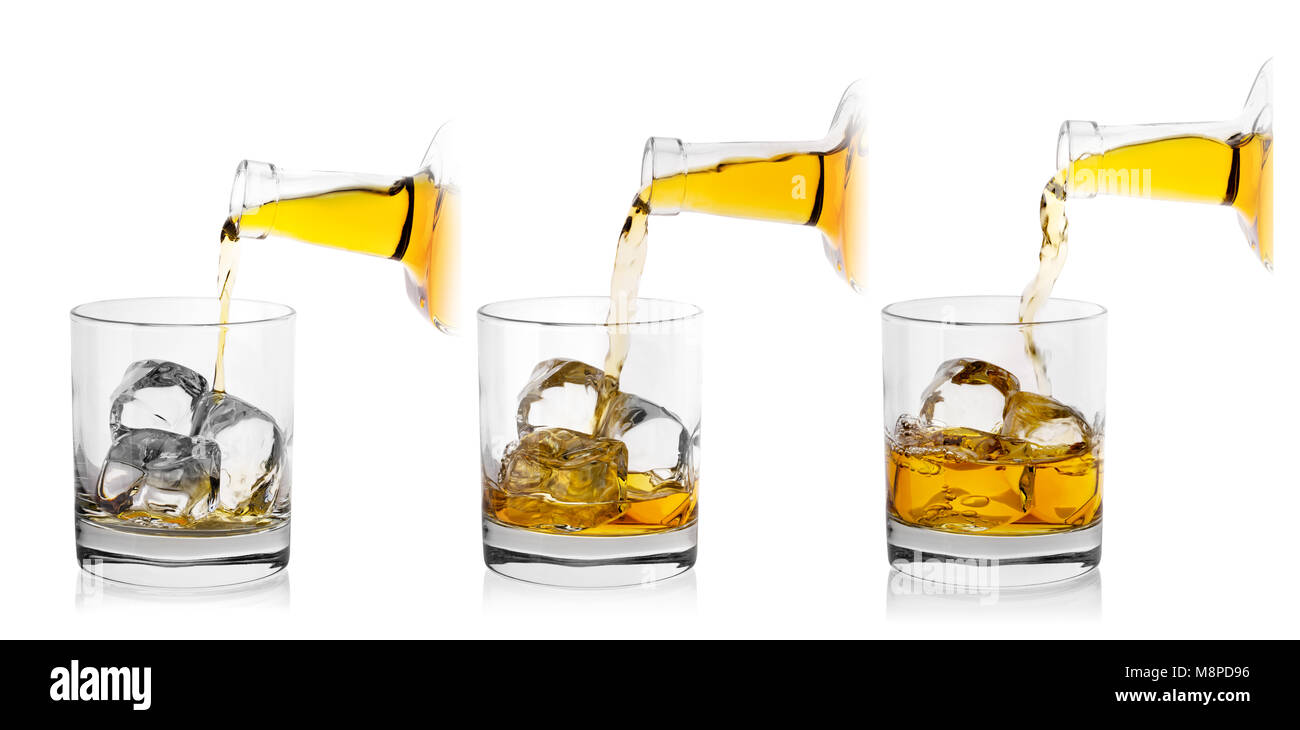 Pouring whisky glass Cut Out Stock Images & Pictures - Alamy