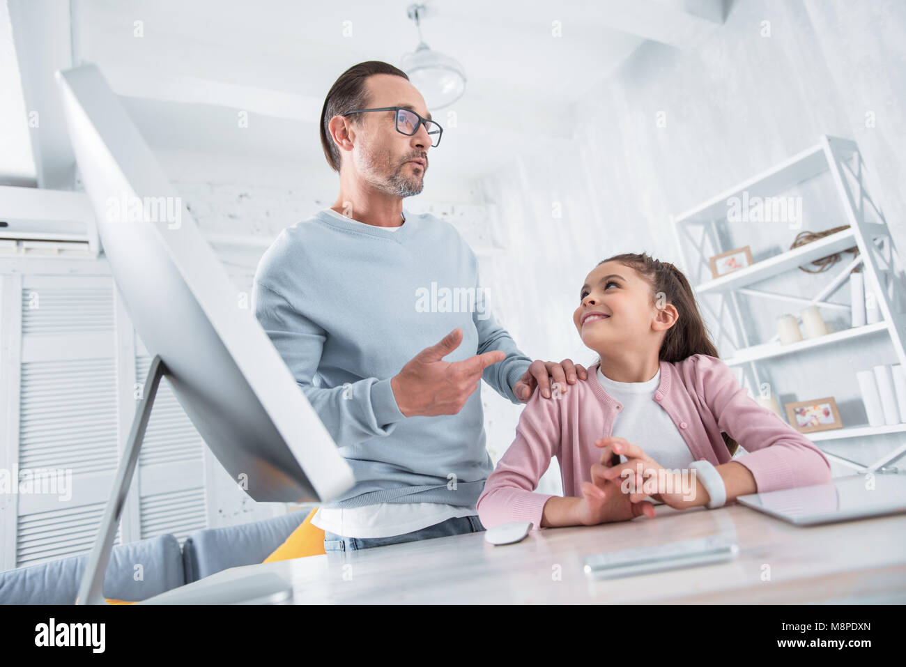 Smart nice man giving an explanation Stock Photo - Alamy