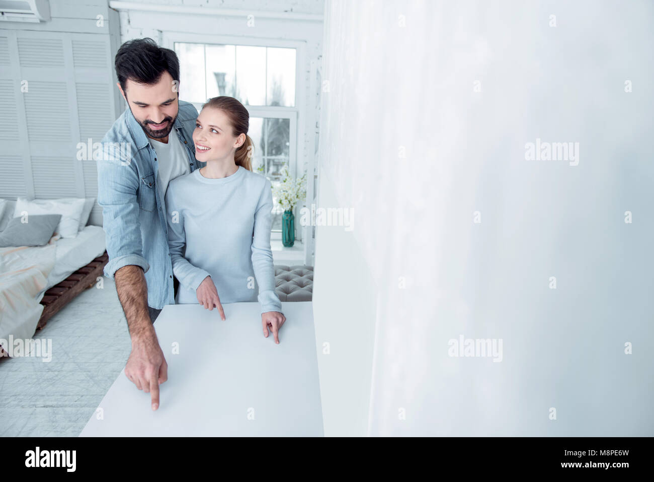 Charming female person looking upwards Stock Photo - Alamy