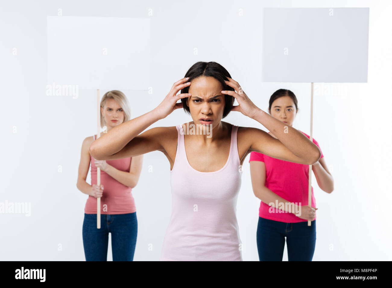 Nice young woman being silent Stock Photo - Alamy