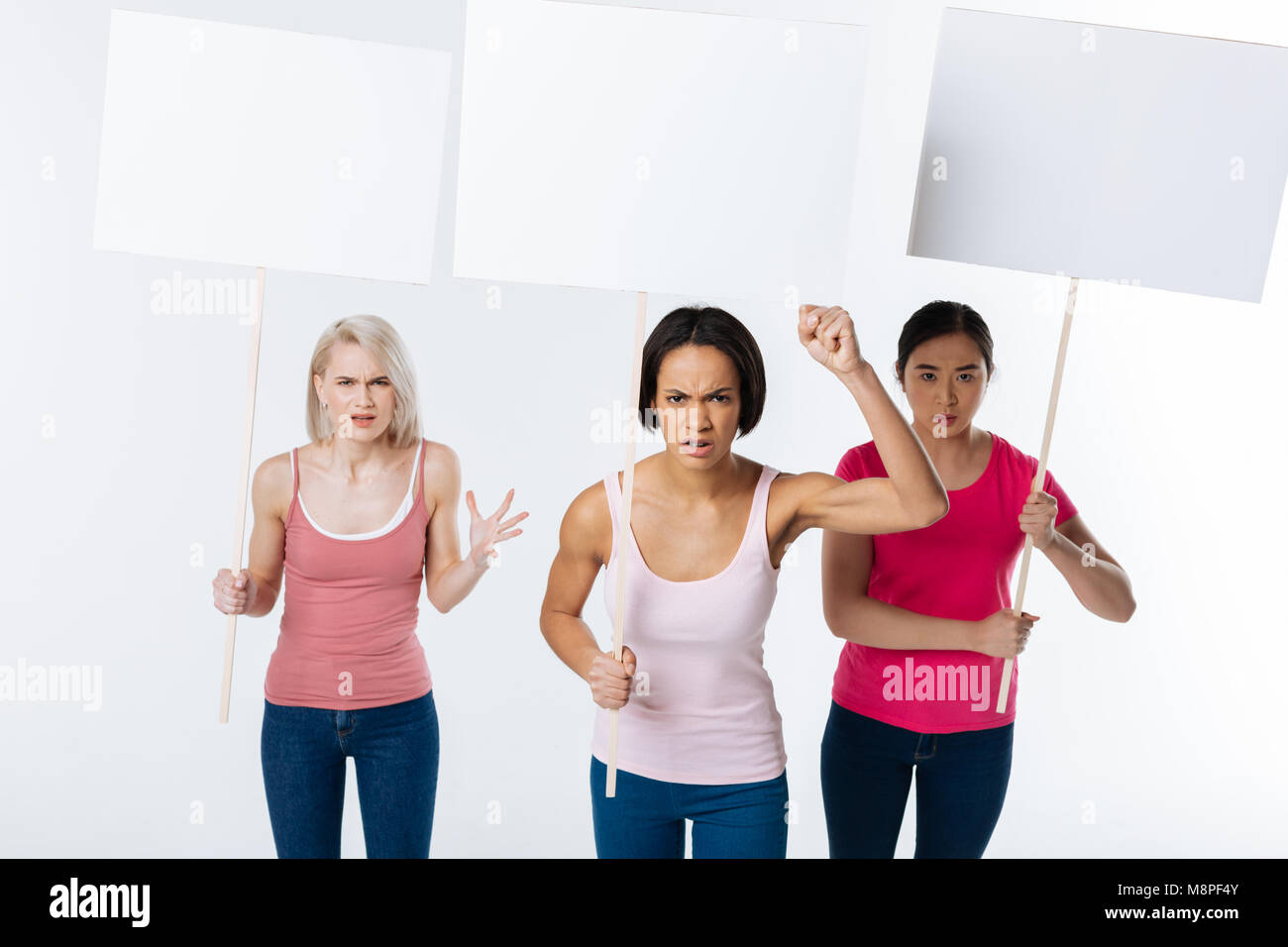 Angry unhappy woman leading the female protest Stock Photo - Alamy