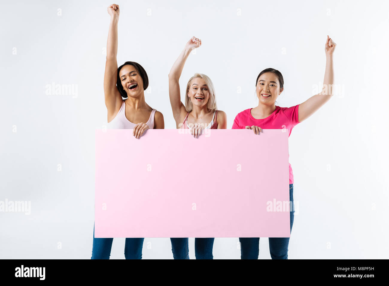 Positive happy women celebrating the success Stock Photo - Alamy
