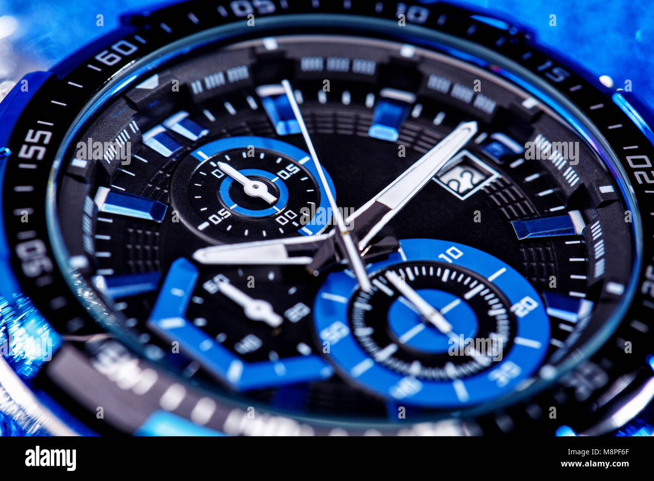 close up view of nice man's wrist watch on blue background Stock Photo ...
