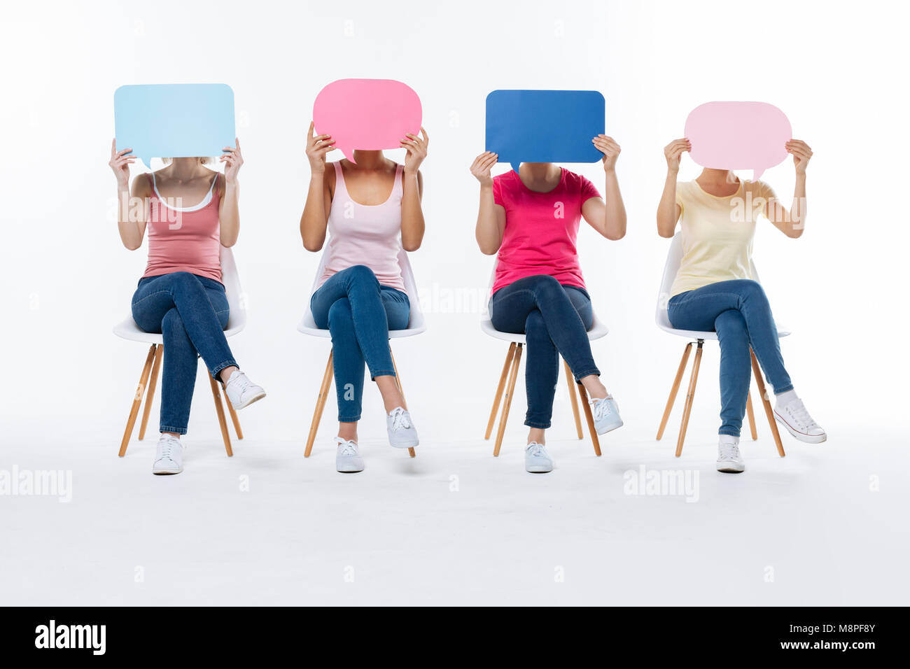 Nice beautiful women hiding their faces Stock Photo - Alamy