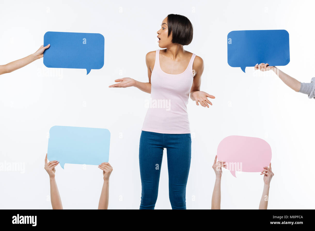 Pleasant young woman looking at the signs Stock Photo - Alamy