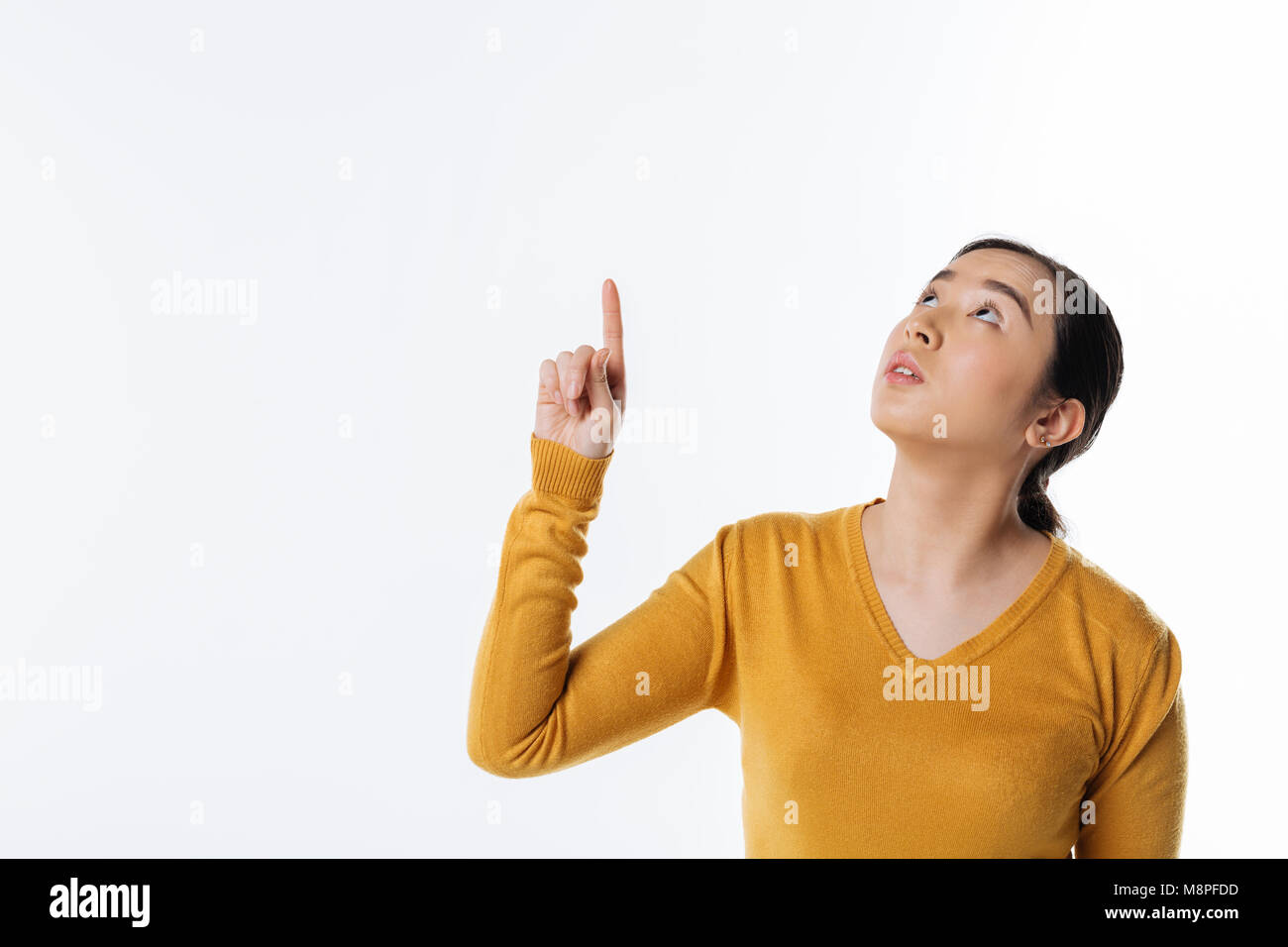 Nice pretty woman looking up Stock Photo - Alamy