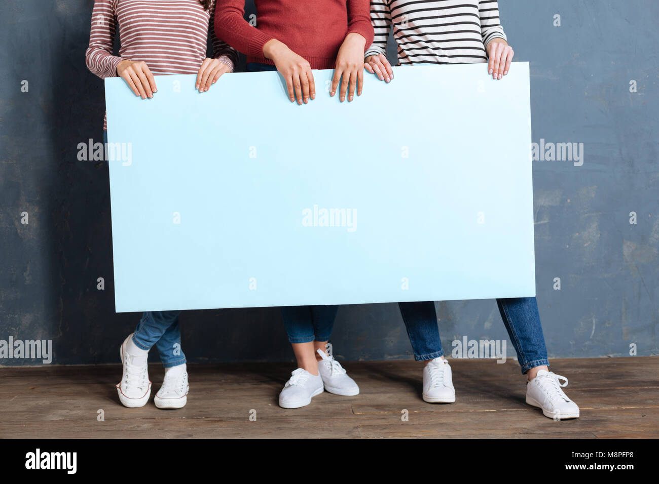 Close up of a big blue poster Stock Photo - Alamy