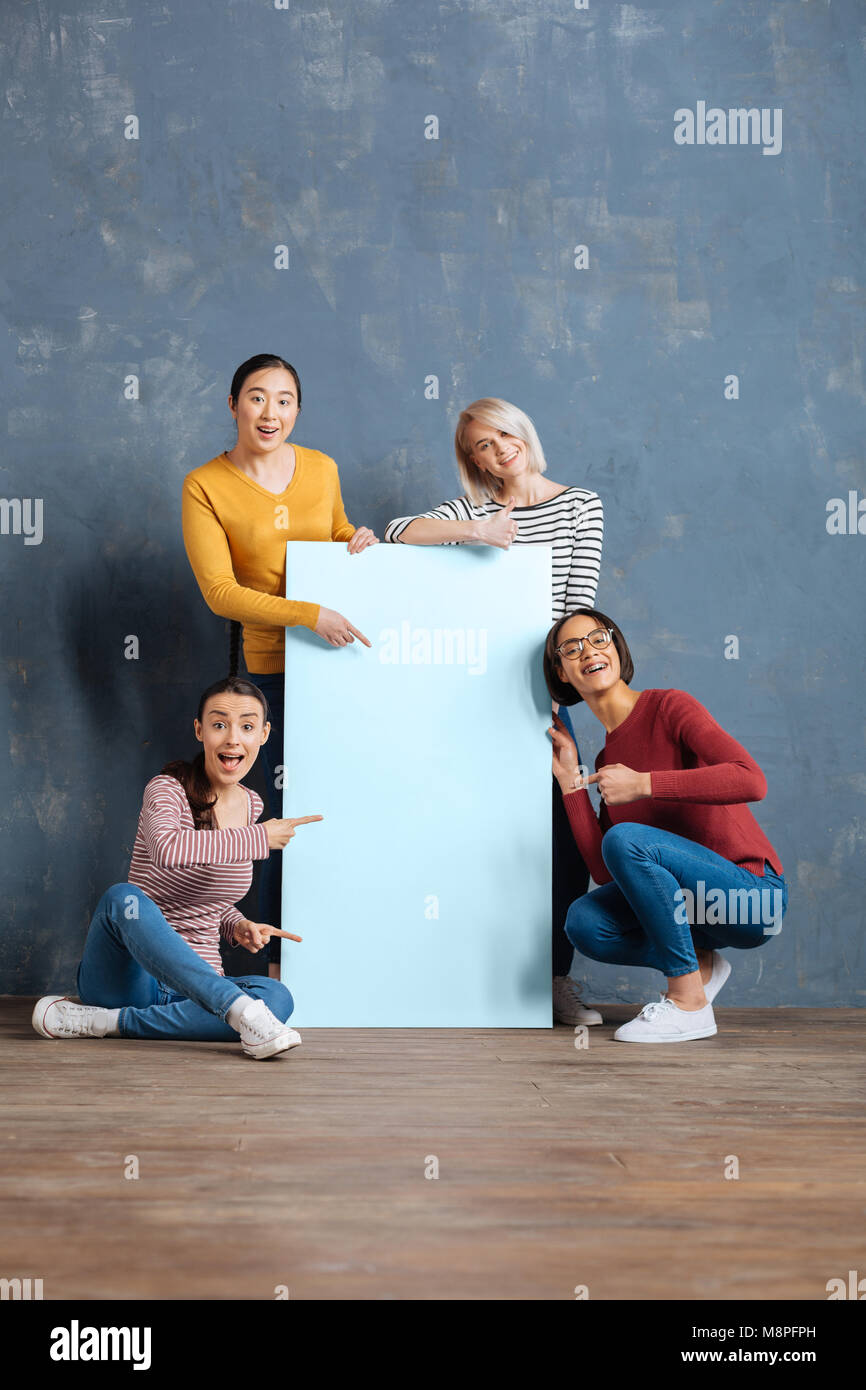 Women standing around hi-res stock photography and images - Alamy