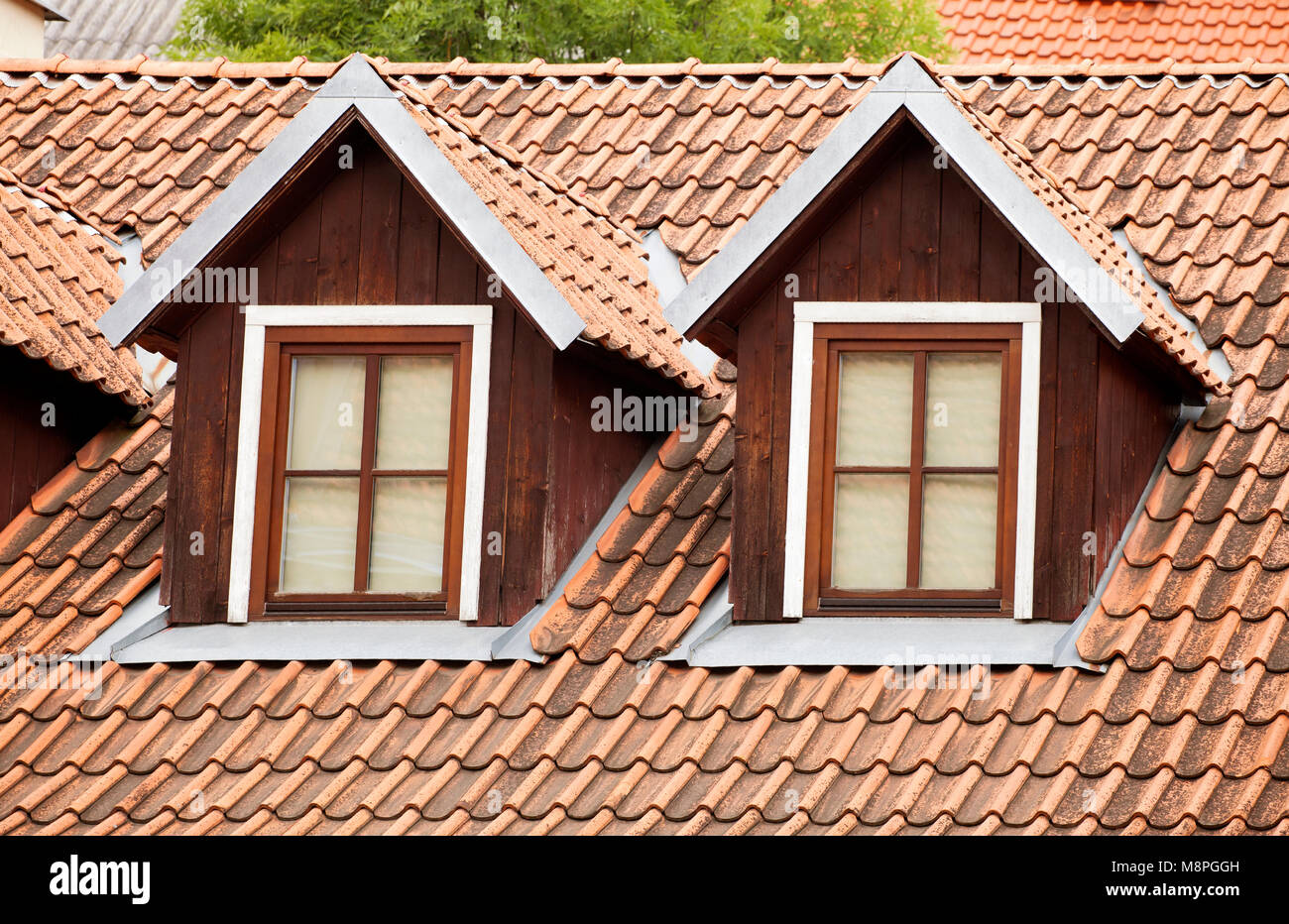 Terracotta tiles roof dormer hi-res stock photography and images - Alamy