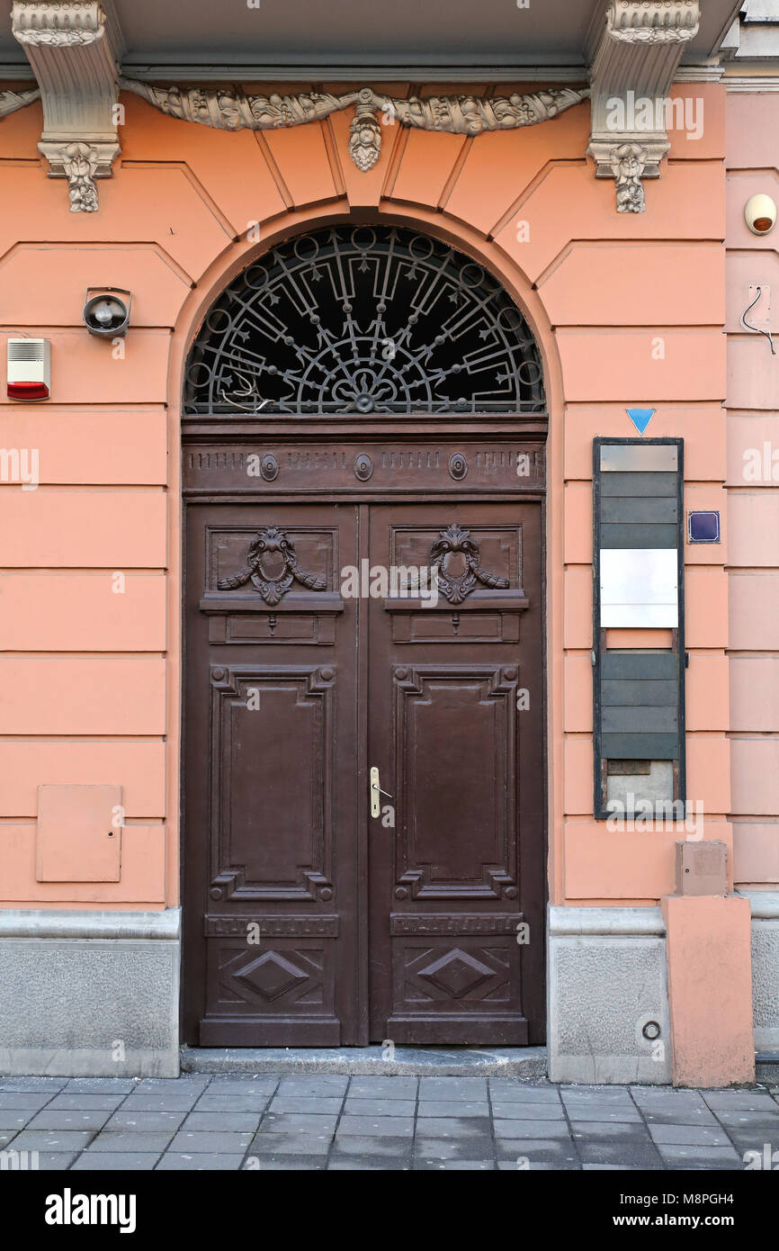 Big Brown Arch Building Entrance Door Stock Photo - Alamy