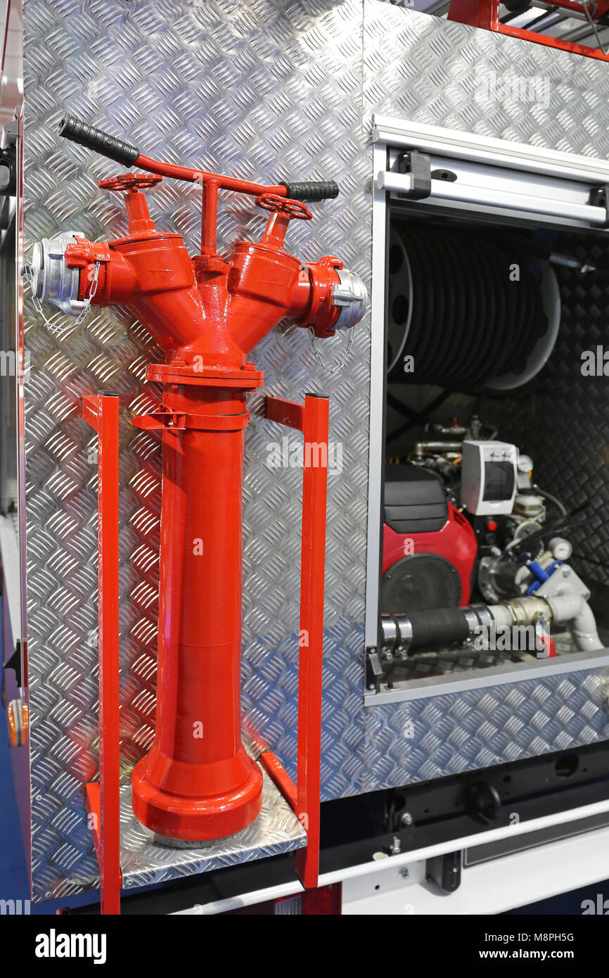Water Hydrant Pipe With Valves at Fire Truck Stock Photo - Alamy