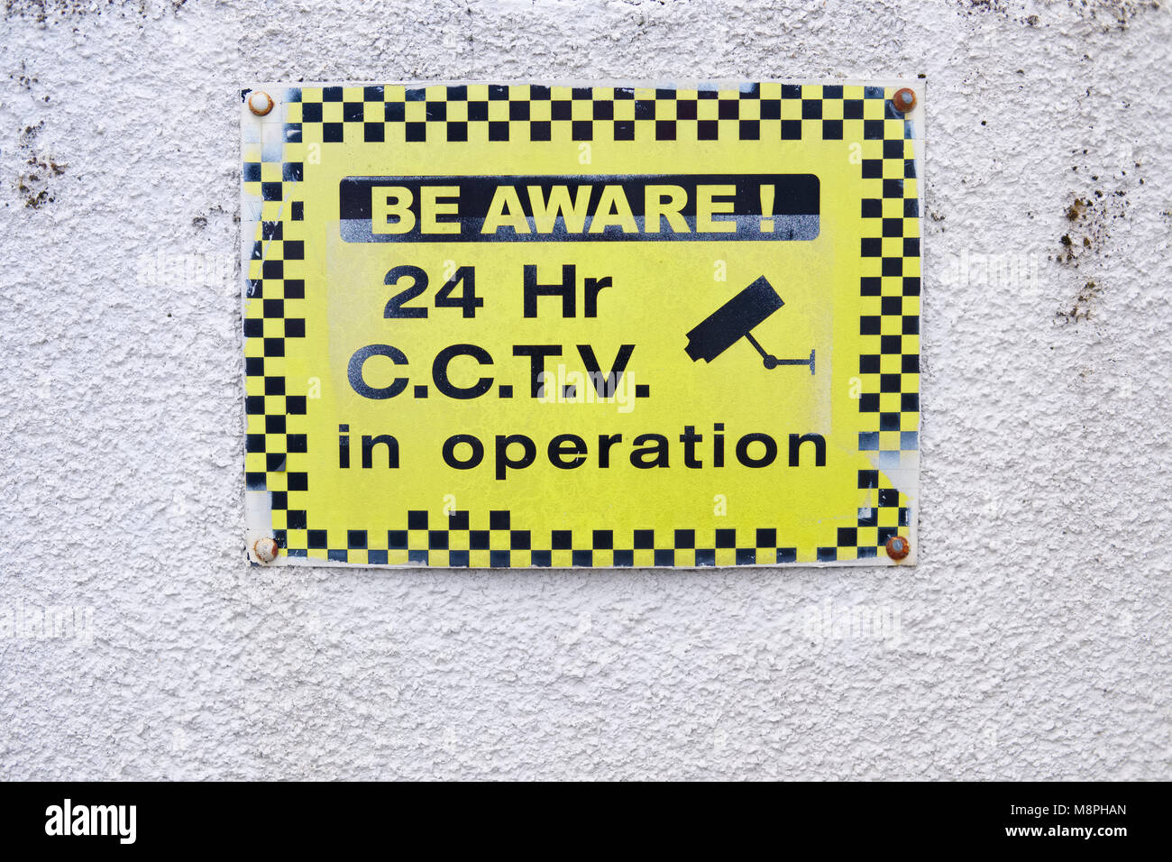 Be aware 24 hr cctv security in operation sign yellow black on wall ...