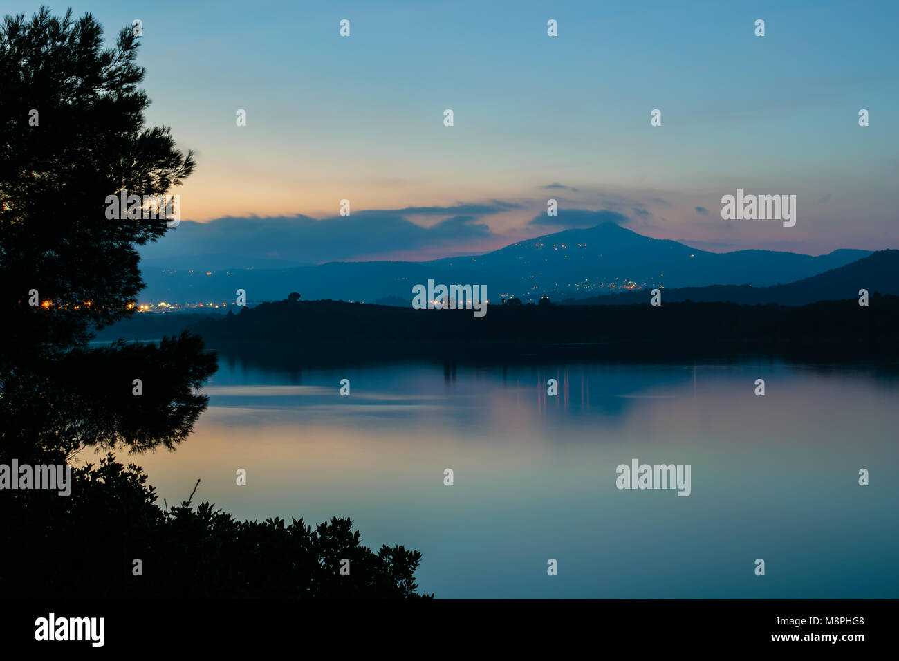 Marathonas lake view at sunset Stock Photo - Alamy