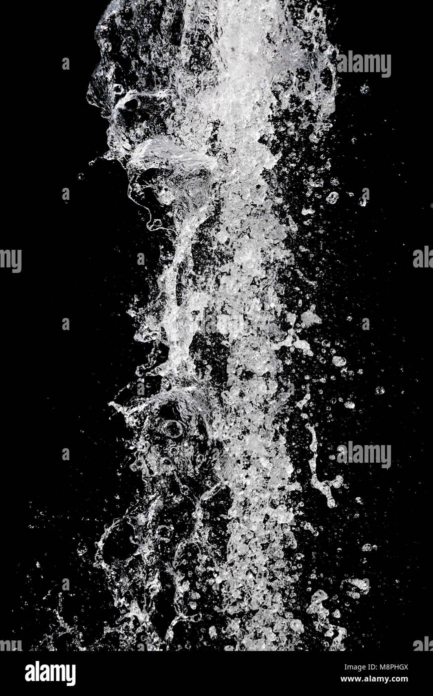 Water splash over black background Stock Photo - Alamy