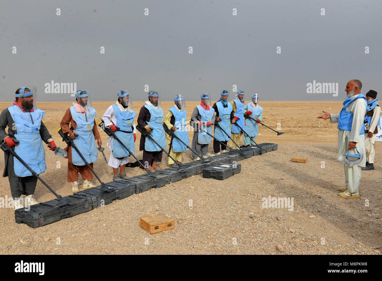 Kandahar, Afghanistan. 19th Mar, 2018. Afghan deminers search for land ...