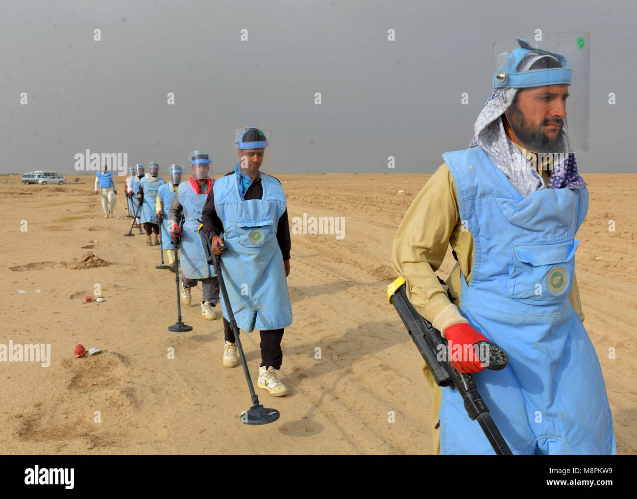 Kandahar, Afghanistan. 19th Mar, 2018. Afghan deminers search for land ...