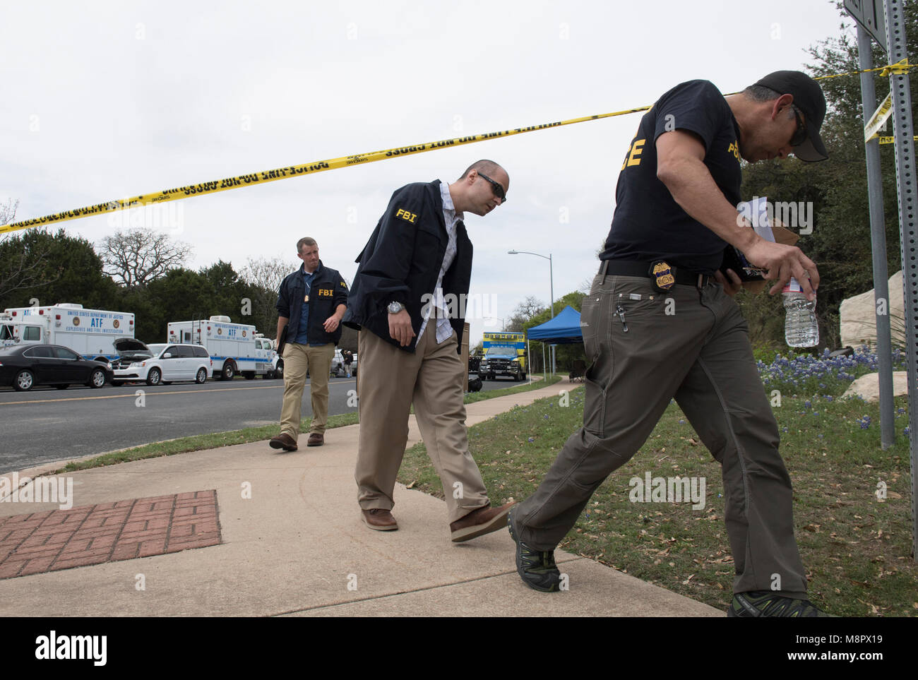 ATF and FBI agents work into the afternoon as a fourth package bomb ...
