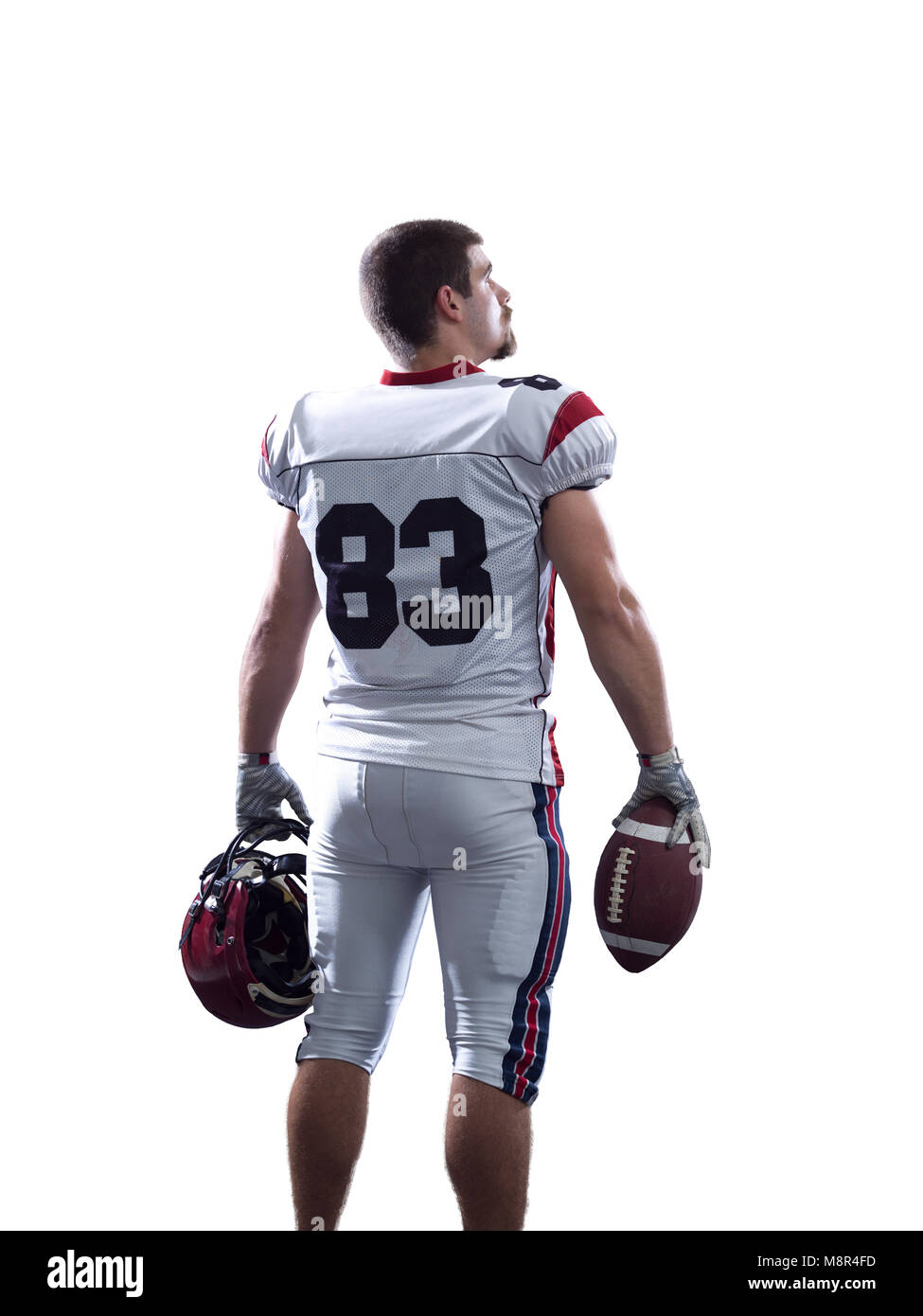 Portrait of a strong muscular American Football Player isolated on ...