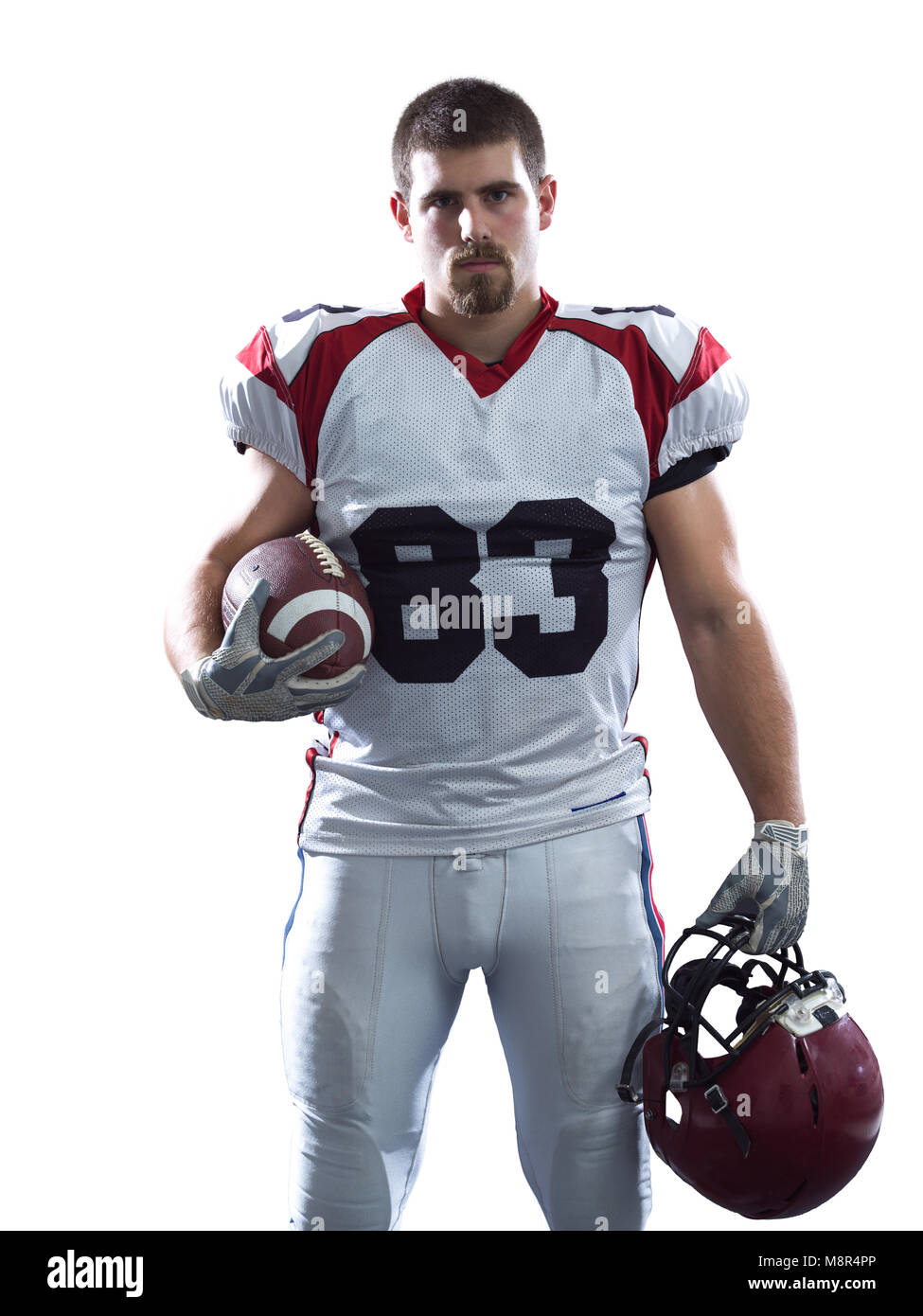 Portrait of a strong muscular American Football Player isolated on ...