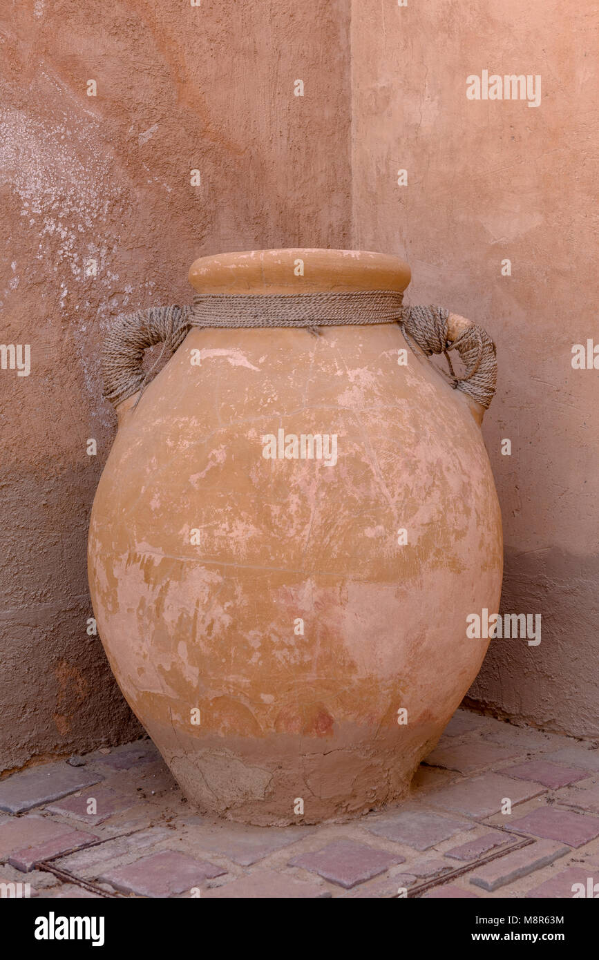 Large brown earthenware water storage vessel in arabic middle east ...