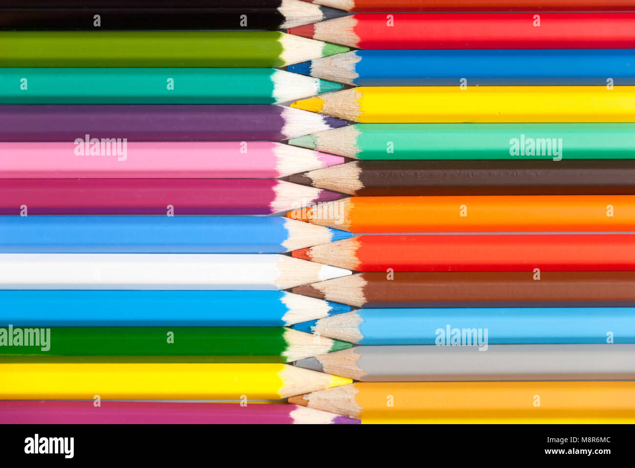 Number of colored pencils on white background Stock Photo - Alamy