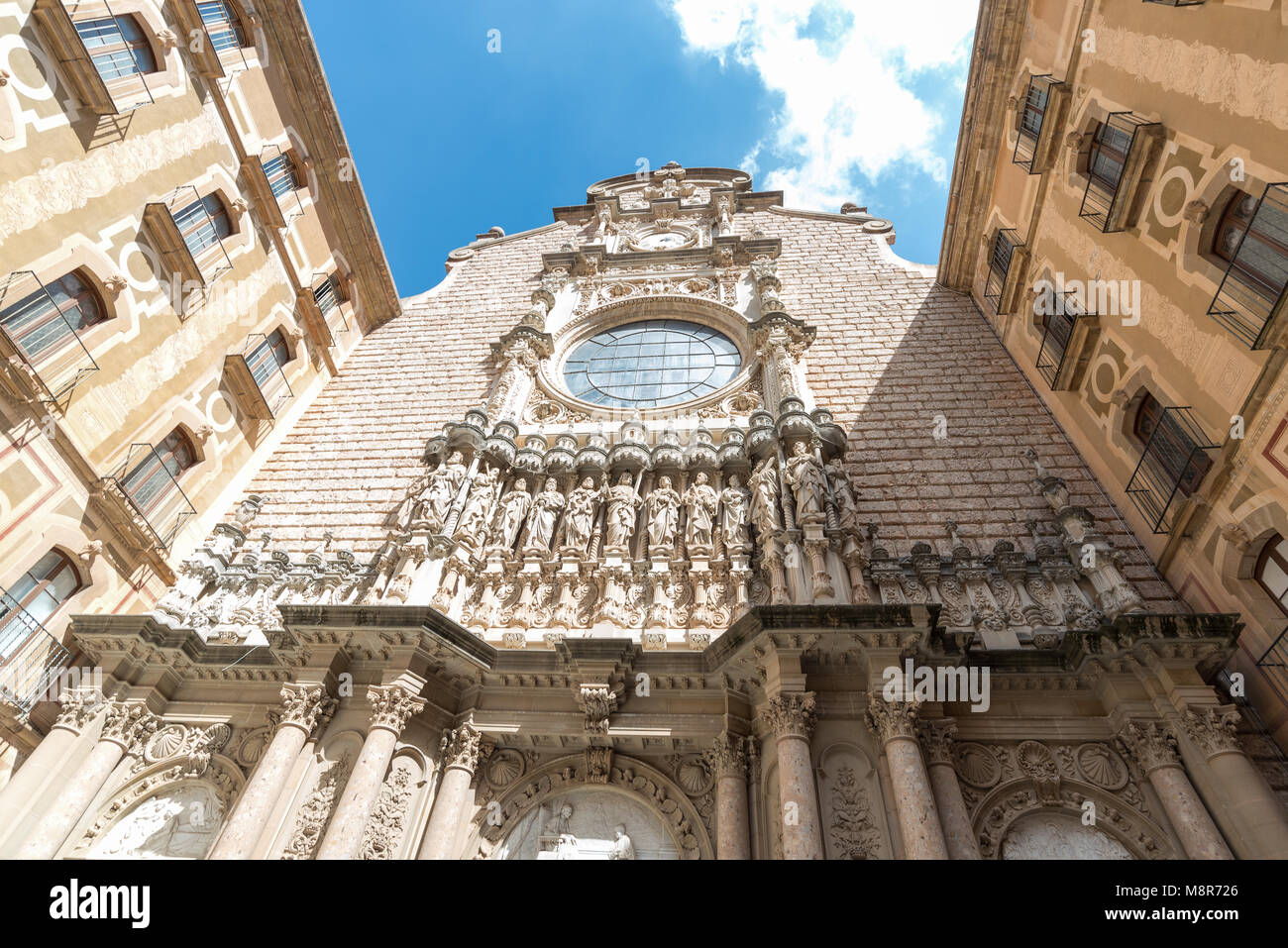 facade of the Santa Maria Montserrat Abbey on the mountain of ...