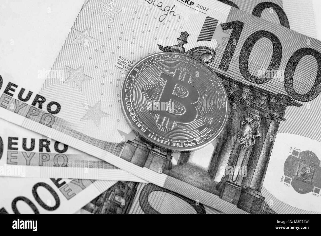 Gold bat against the background of the European currency. The ...