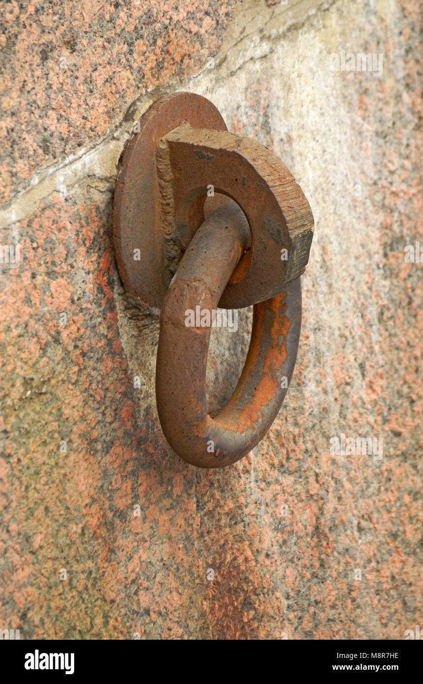 Metal ring on a granite embankment.A historical piece of architecture ...