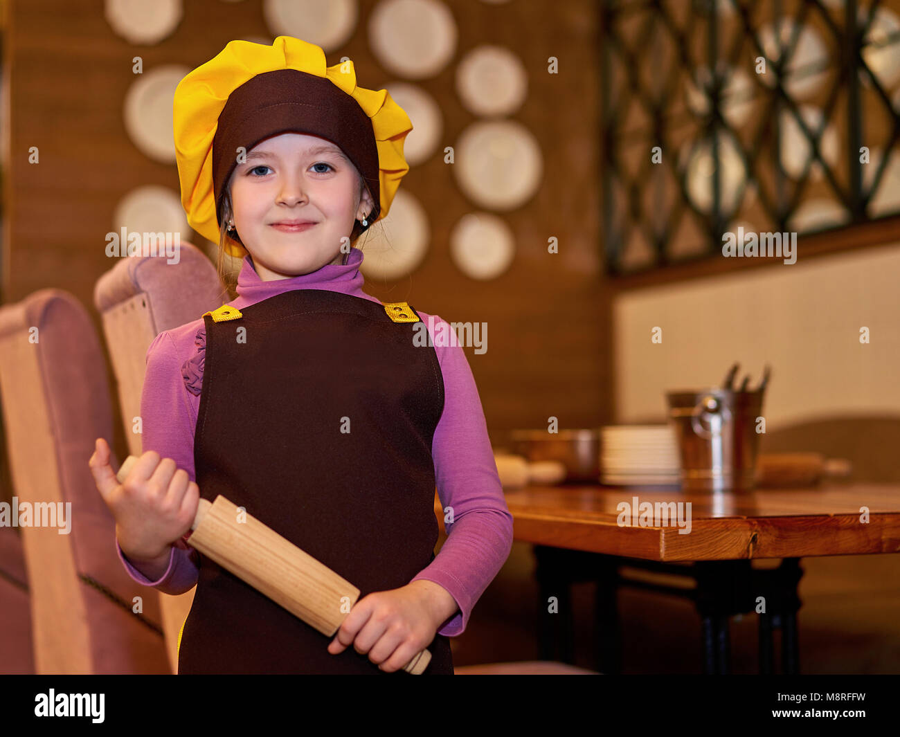 little girl in the hood chef restaurant Stock Photo - Alamy