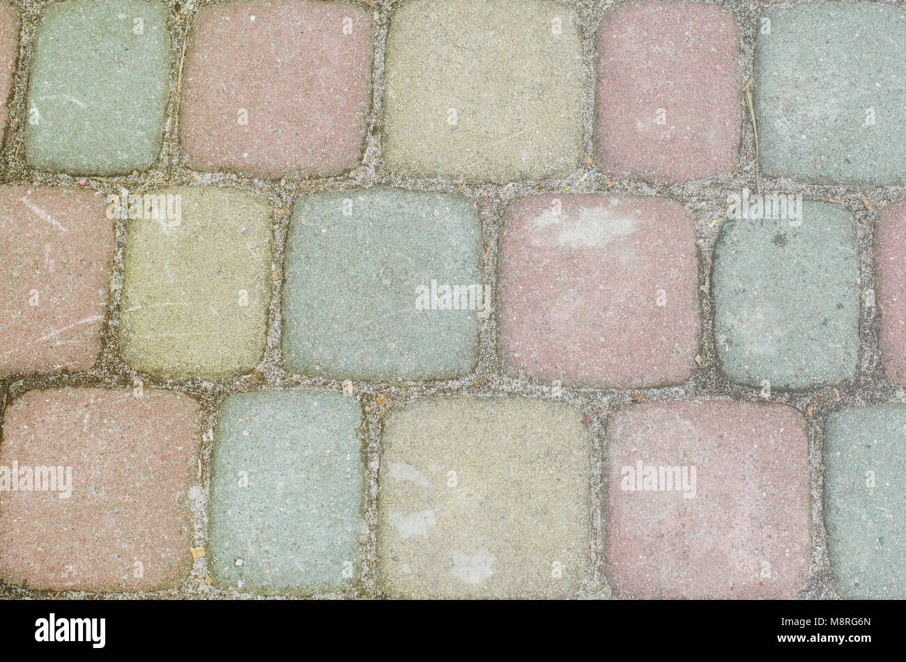 Texture of multi-colored cobblestone road. Concrete, cobbles grey ...