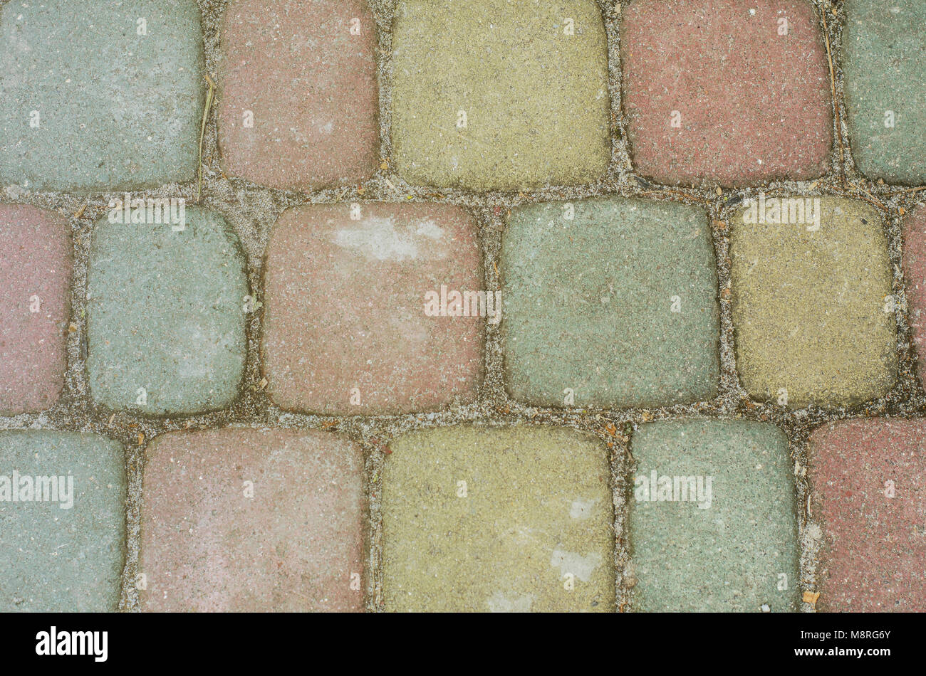 Texture of multi-colored cobblestone road. Concrete, cobbles grey ...