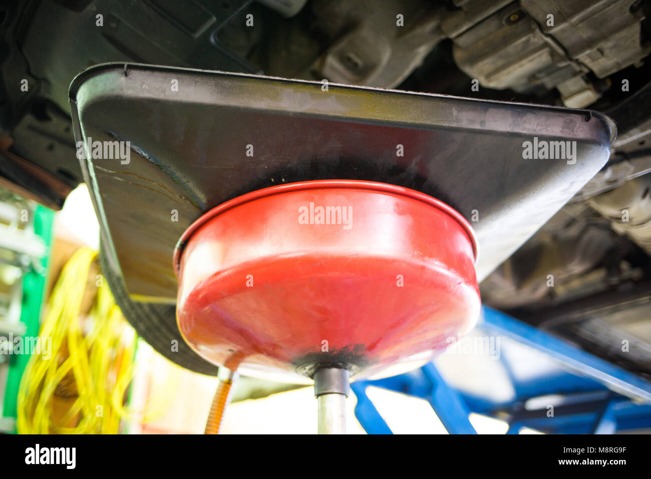Car oil change service inside garage set Stock Photo - Alamy