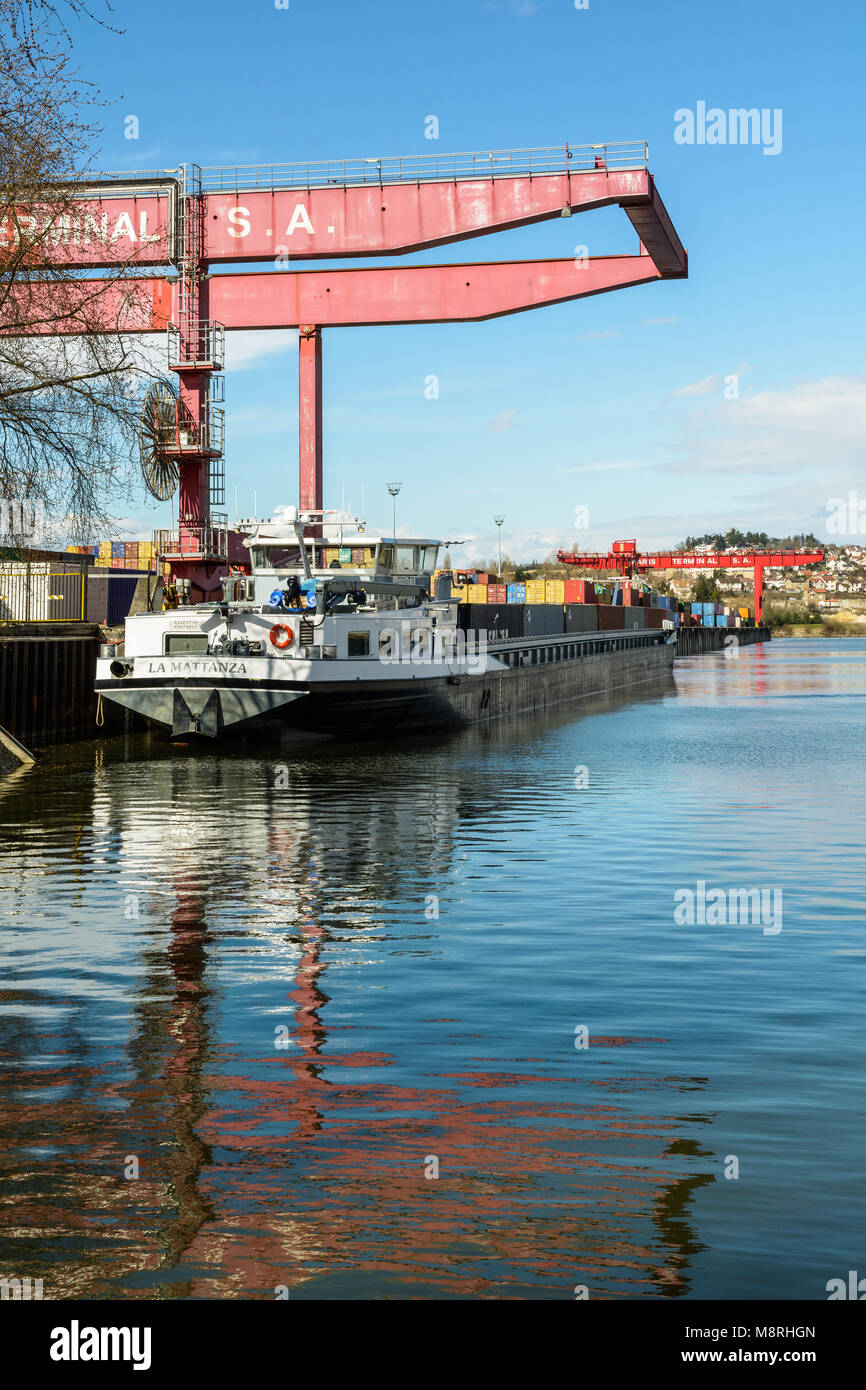 Gennevilliers, France - March 11, 2018: A barge loaded with containers ...