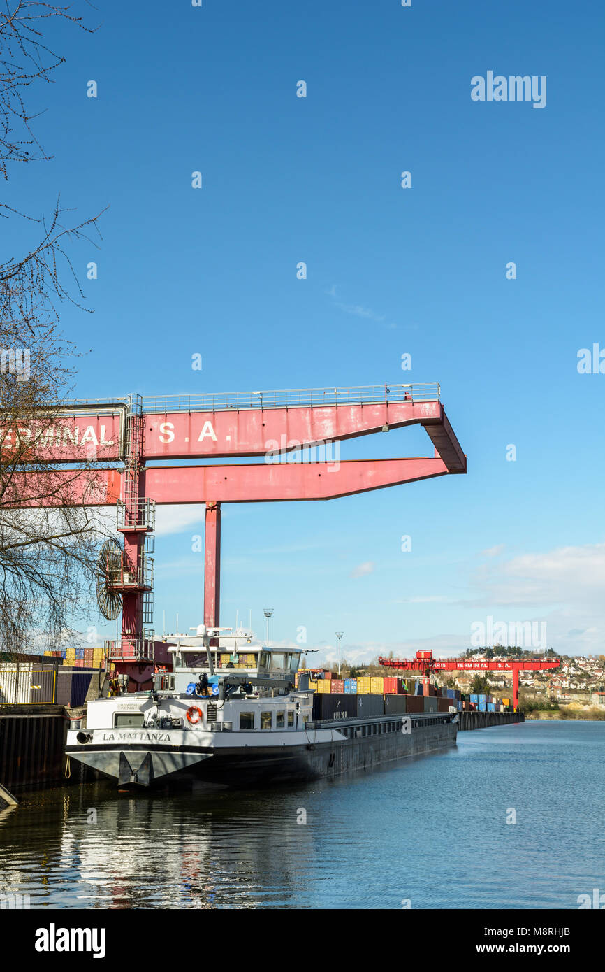 Gennevilliers, France - March 11, 2018: A barge loaded with containers ...