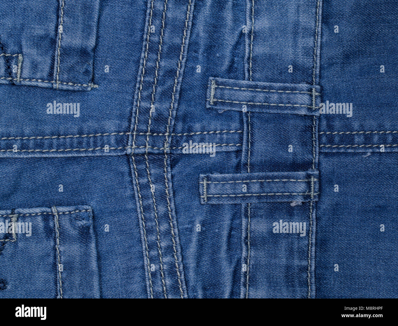 View of textured blue jeans from the back pocket Stock Photo - Alamy